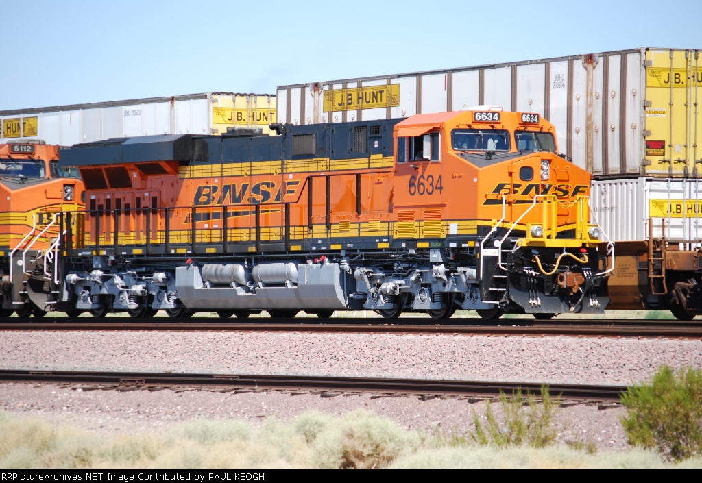 BNSF 6634 distance shot as the crew sits waiting to roll east.